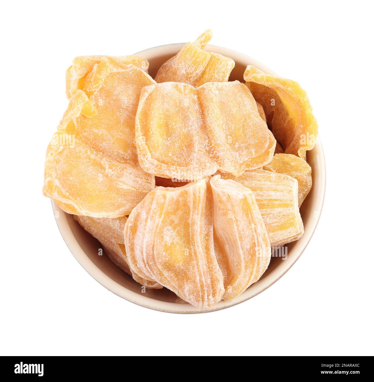 Delicious dried jackfruit slices in bowl isolated on white, top view ...