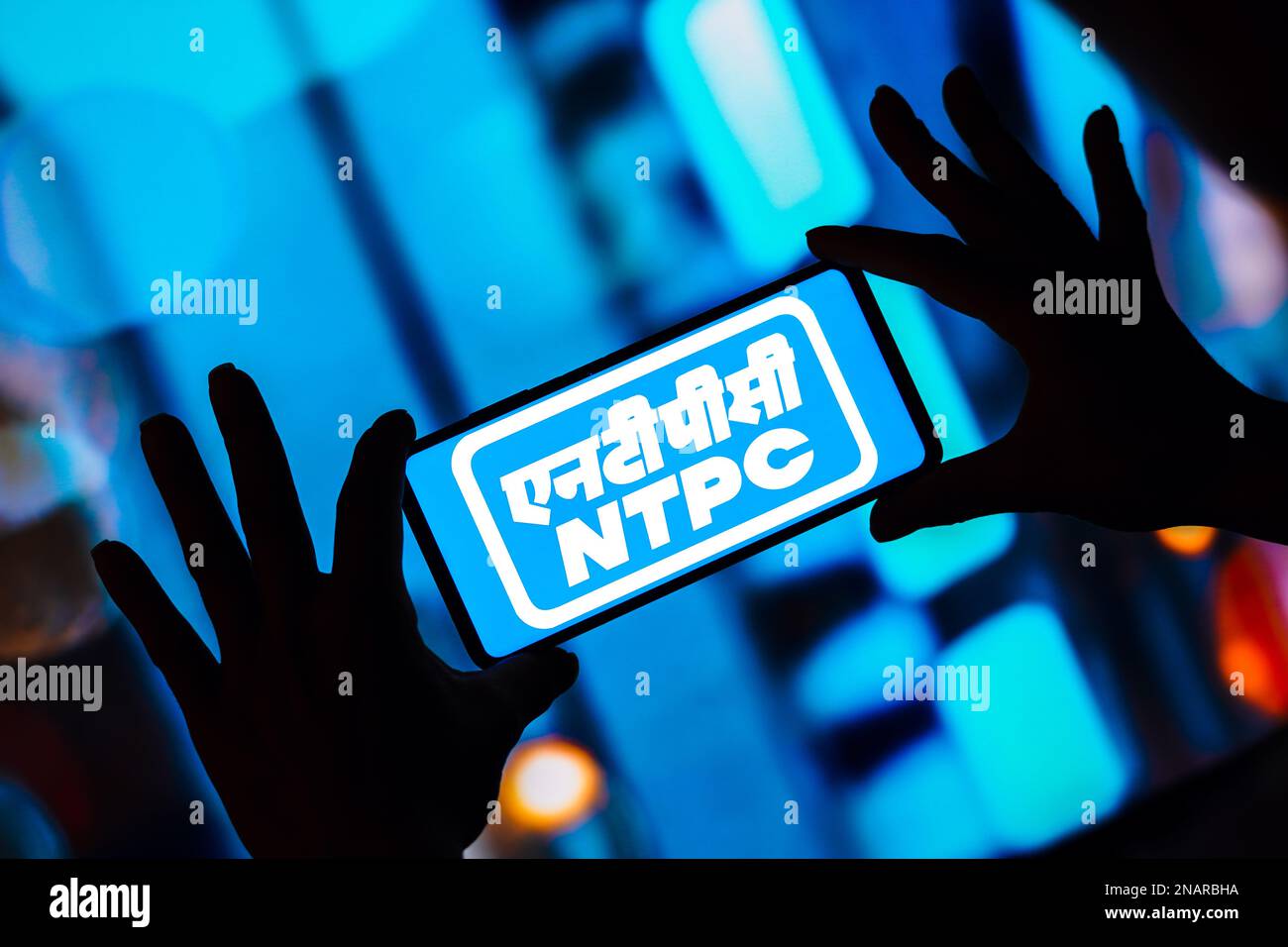 In this photo illustration, the NTPC Limited logo is seen displayed on ...