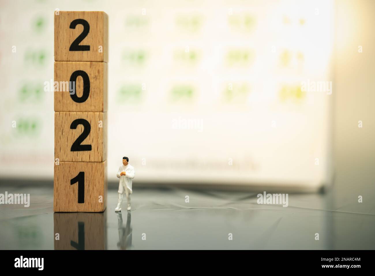2021 New Year Healthcare and Business Concept. Doctor miniature figure ...