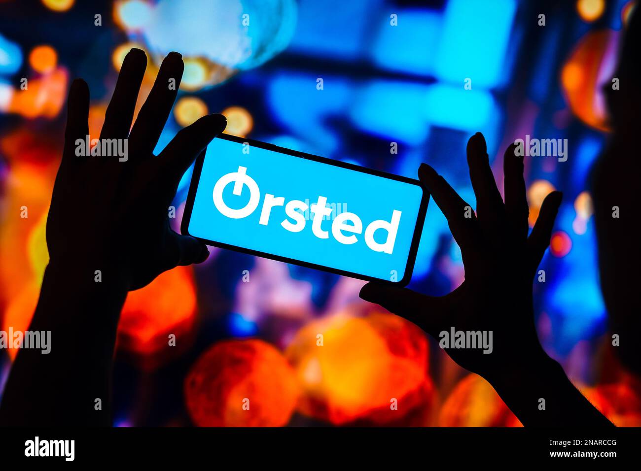 In this photo illustration, the Orsted A/S logo is seen displayed on a ...
