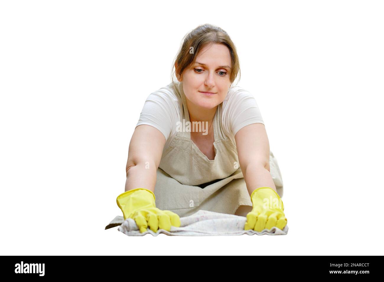 A woman washes the floor with a rag when cleaning the home kitchen ...