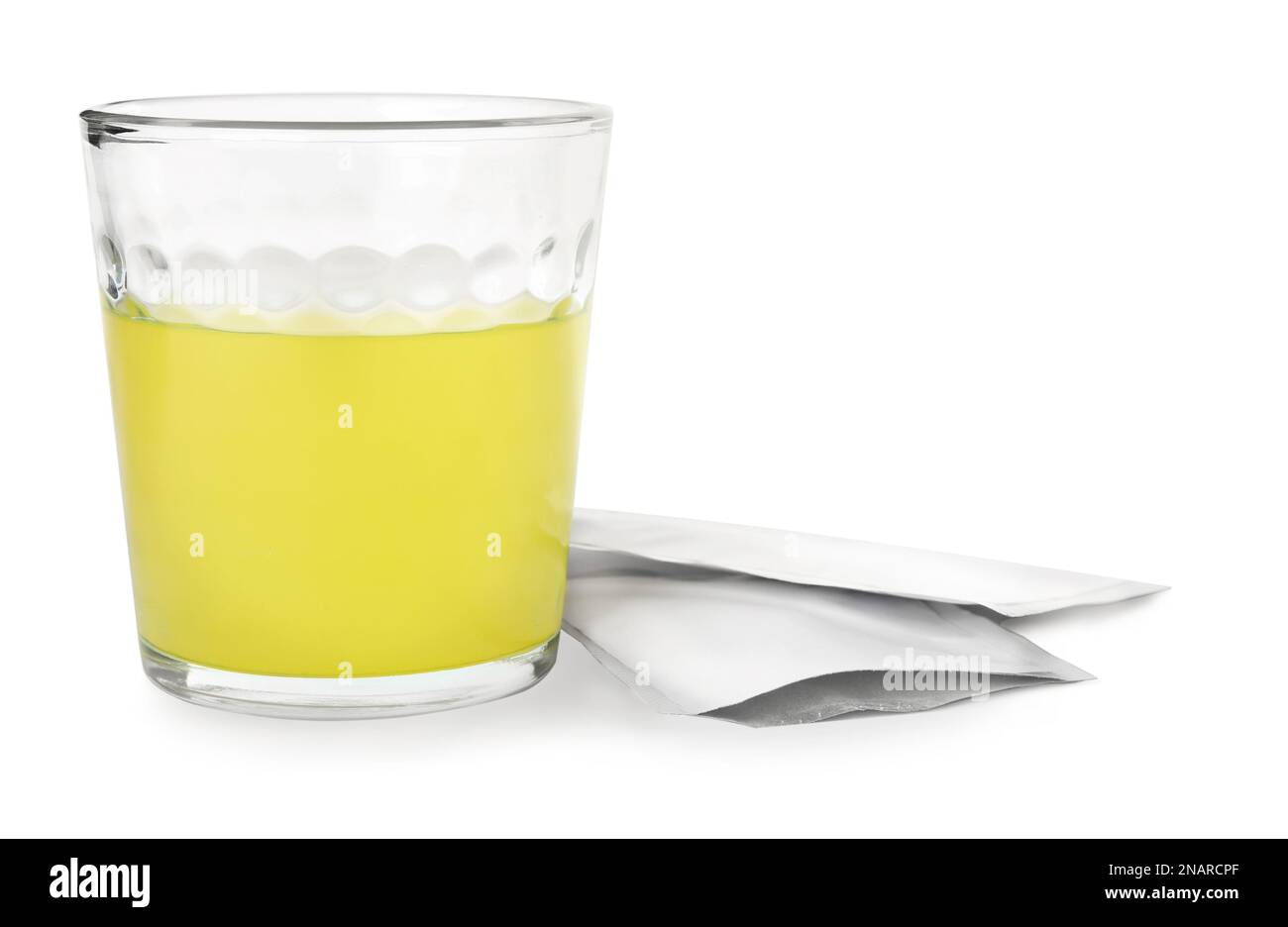 Glass of dissolved medicine and sachets on white background Stock Photo ...
