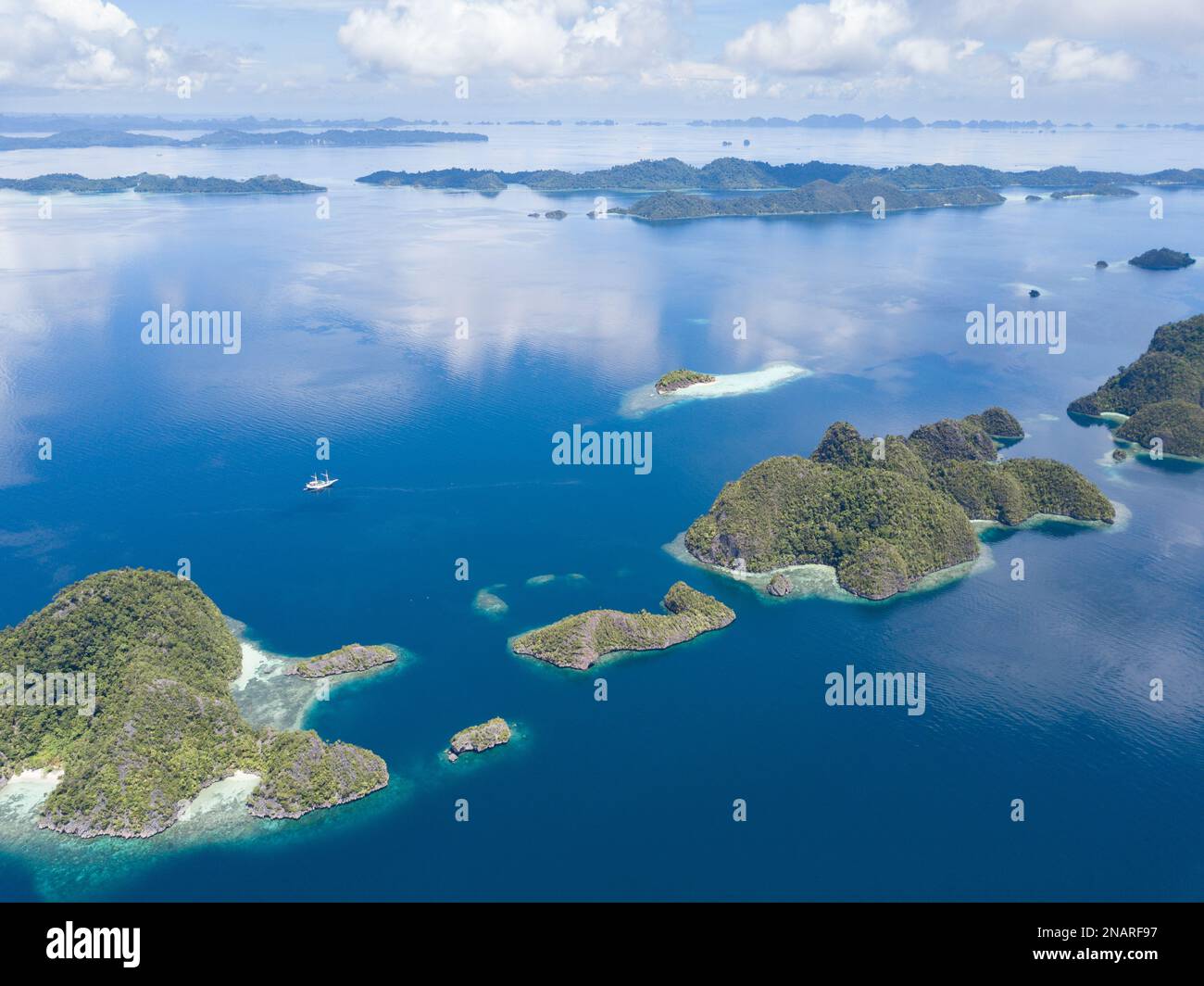 Beautiful limestone islands rise from the Raja Ampat, Indonesia ...