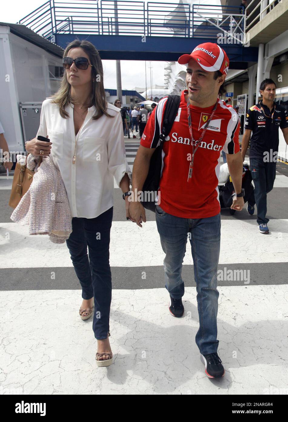 Ferrari driver Felipe Massa of Brazil, right, and his wife Rafaela ...