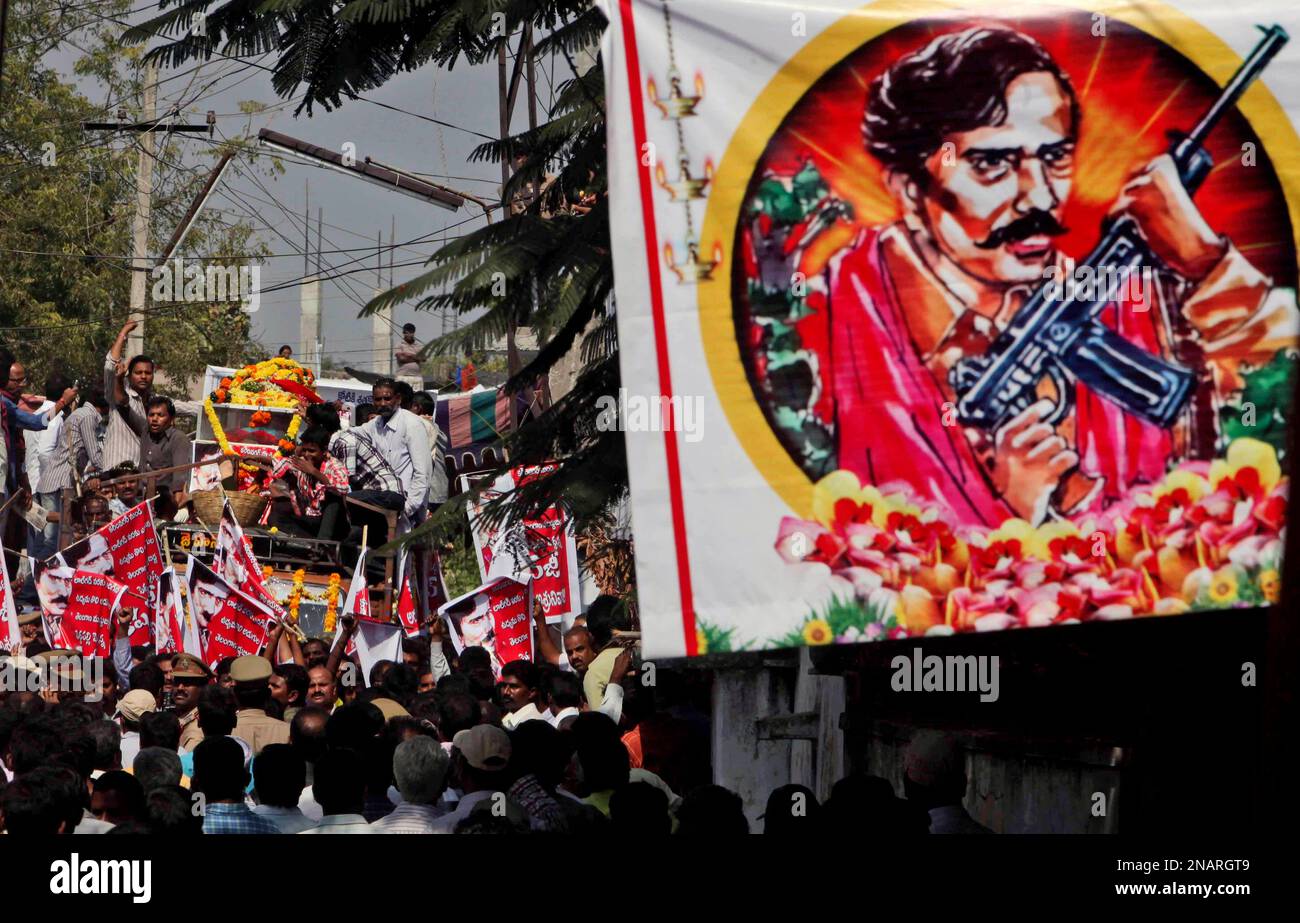 Relatives and supporters accompany the body of Kishenji, a senior ...