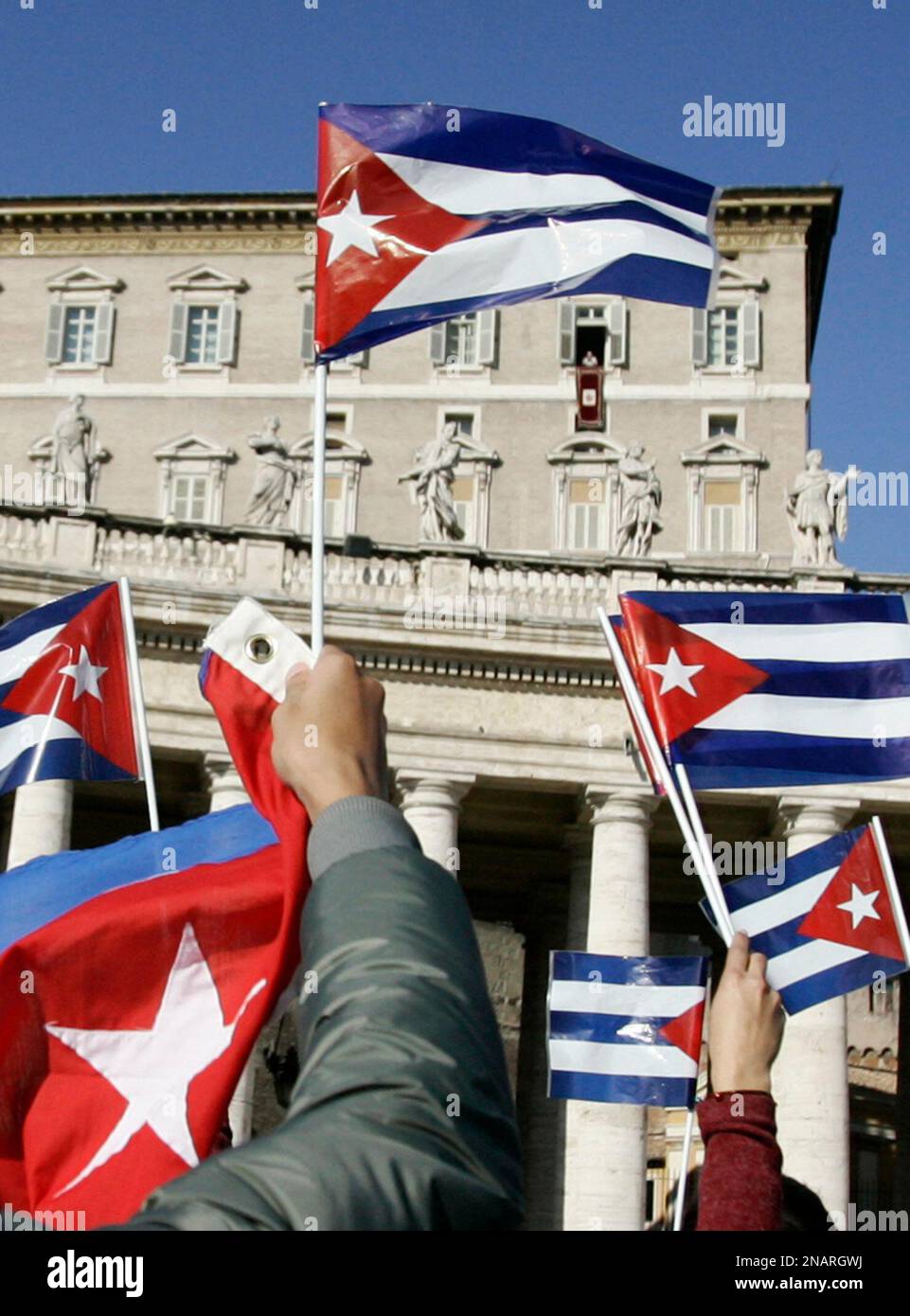 Cubans living in Italy wave their homeland flags as Pope Benedict XVI ...