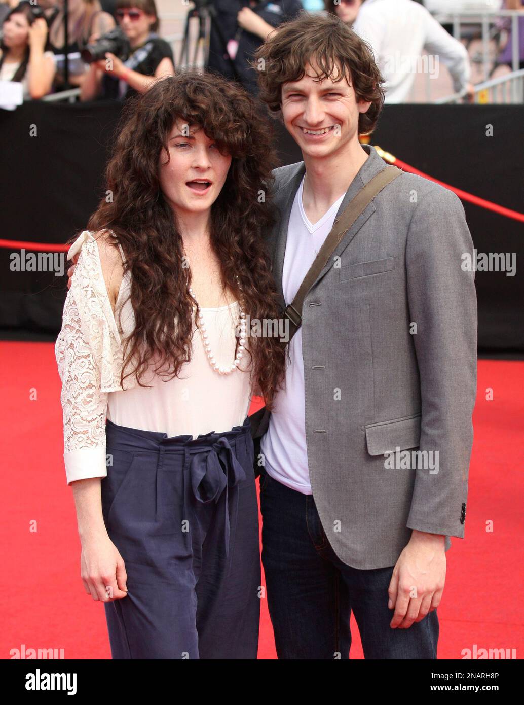 Gotye, right, poses upon arrival for the Australian Record Industry ...