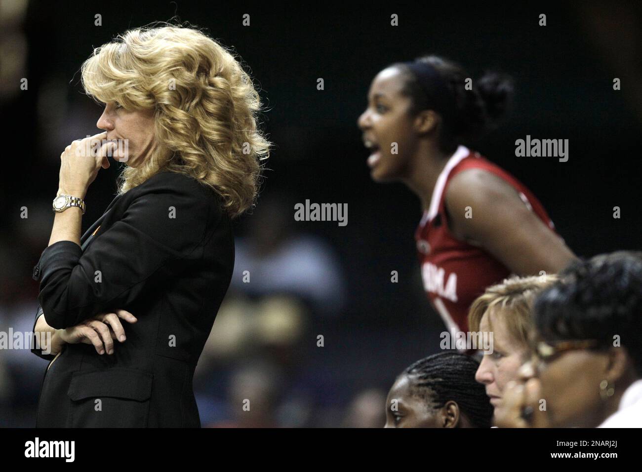 Oklahoma coach Sherri Coale, left, watches from the bench late in the ...