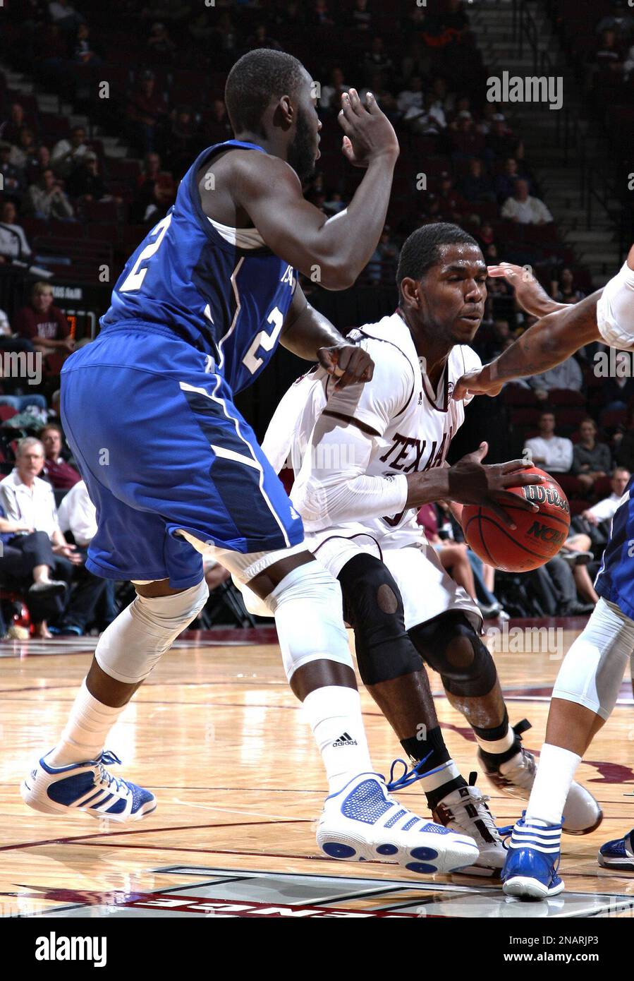 Texas A&M's Ray Turner, right, drives the ball against Texas A&M-Corpus ...