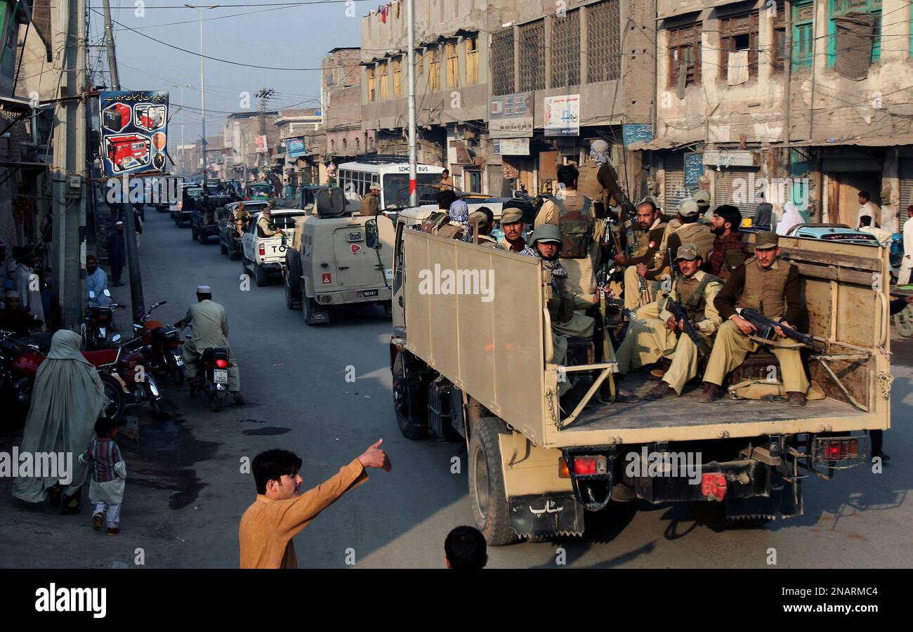 Troops of Pakistan's paramilitary force patrol in downtown Peshawar ...