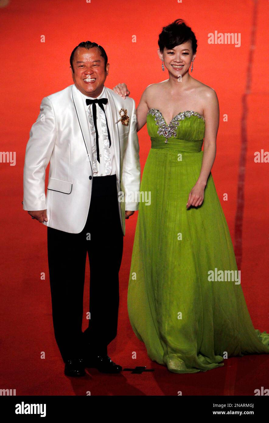 Hong Kong actor Eric Tsang, left, and his daughter Bowie Tseng pose on ...