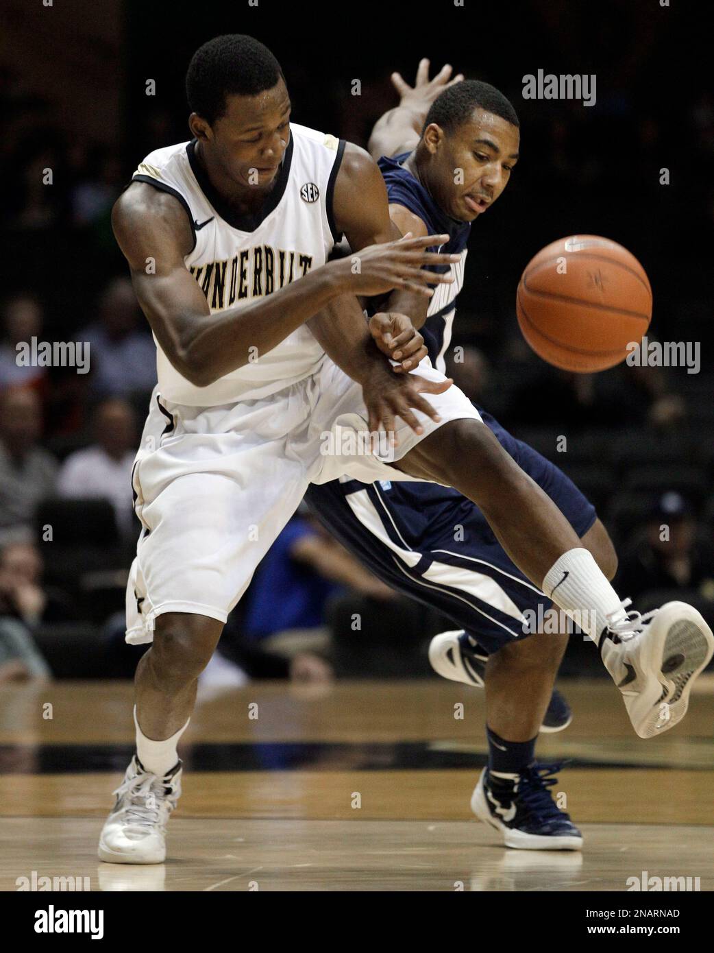 Vanderbilt forward Rod Odom, left, battles Monmouth guard Dion Nesmith ...