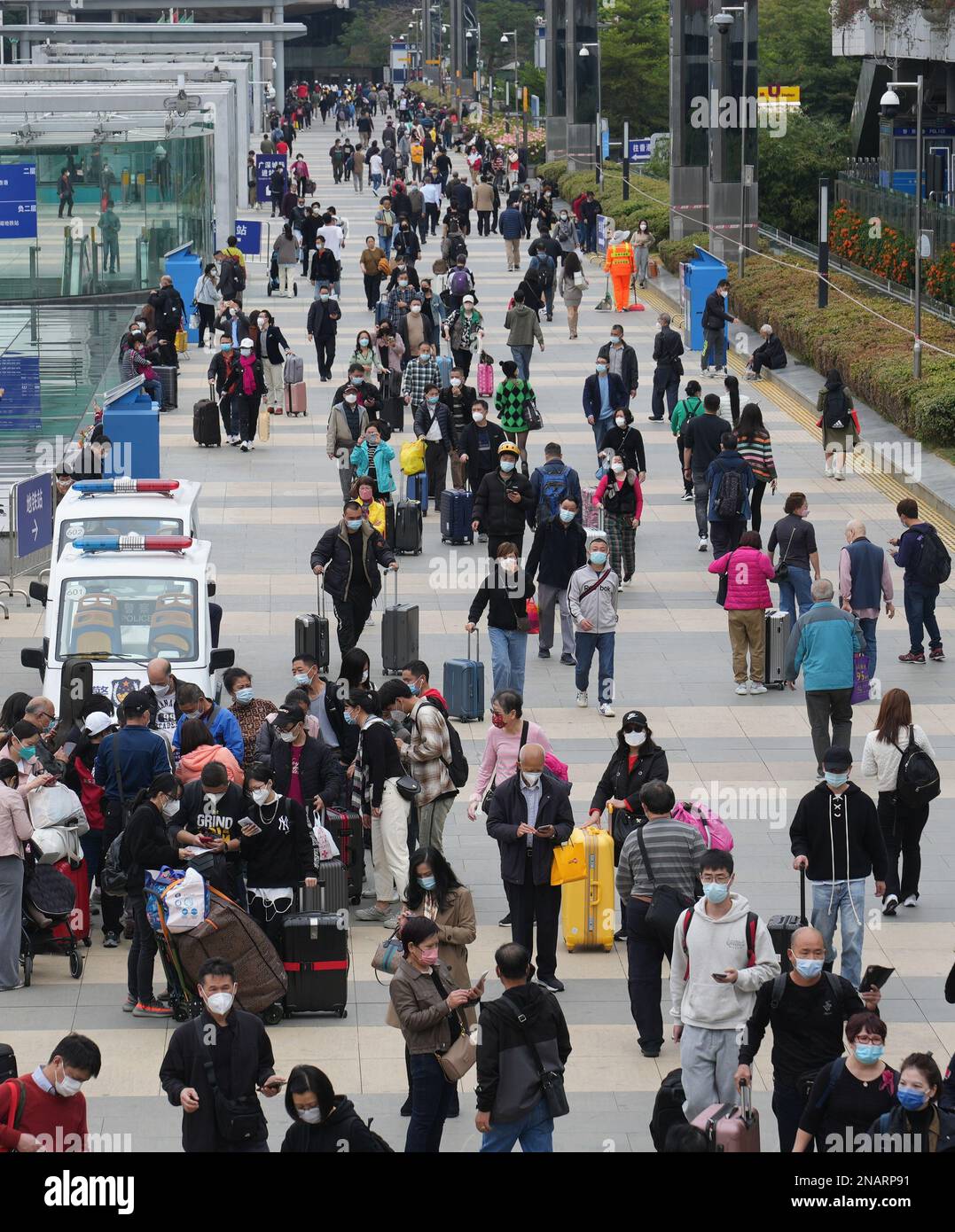 Travellers arrive at Lo Wu Control Point in Shenzhen, and ready to ...