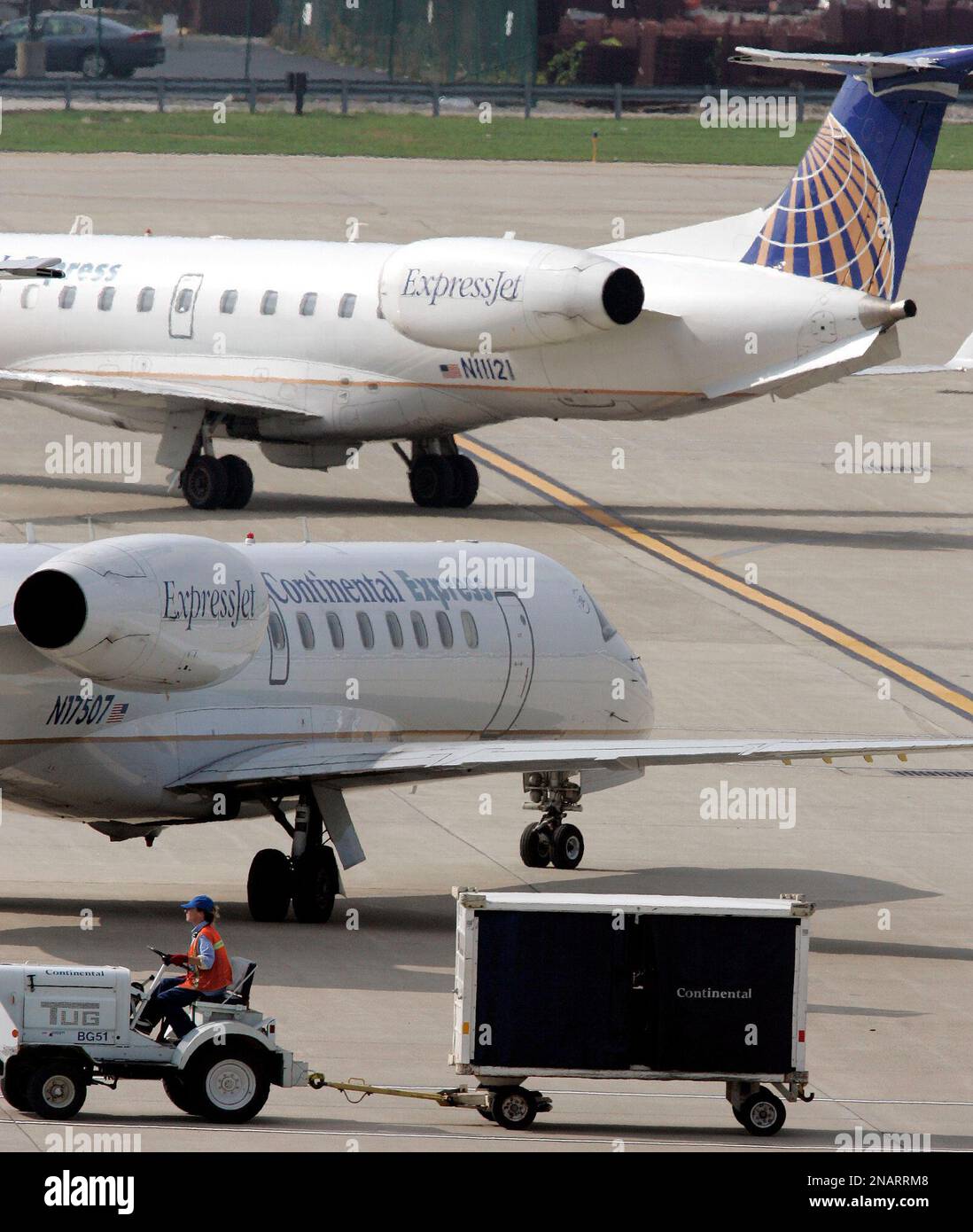 FILE - In this Oct. 10, 2005 file photo, two Continental Express ...