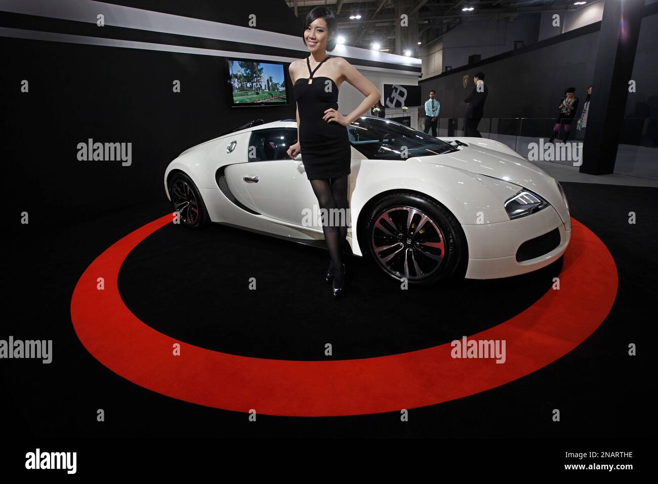 In this photo taken on Thursday, Nov. 24, 2011, a model poses in front ...