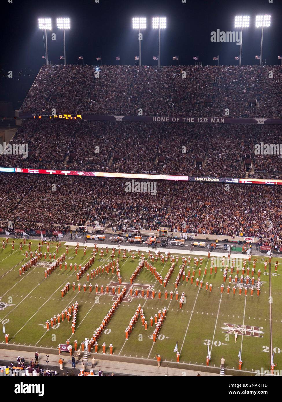The Texas marching band acknowledges the Texas A&M marching band with a ...