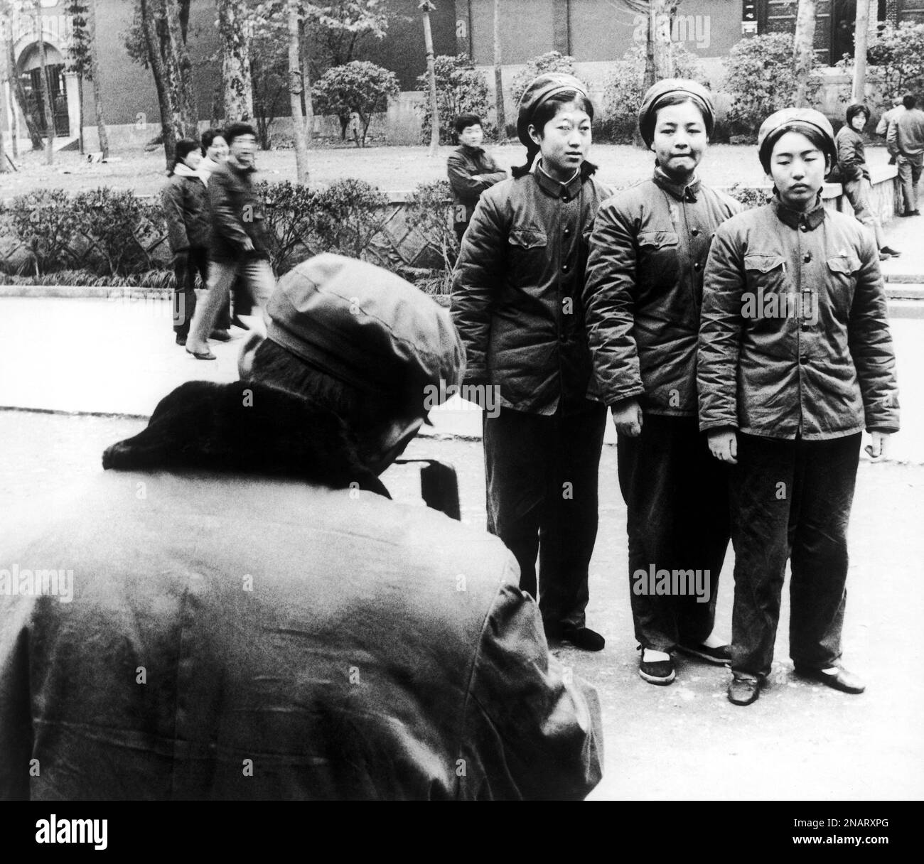 Three women soldiers of China’s Peoples Liberation Army line up for a ...