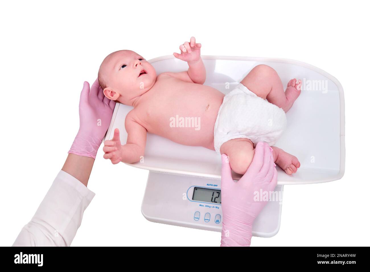Weighing a newborn baby Cut Out Stock Images & Pictures - Alamy