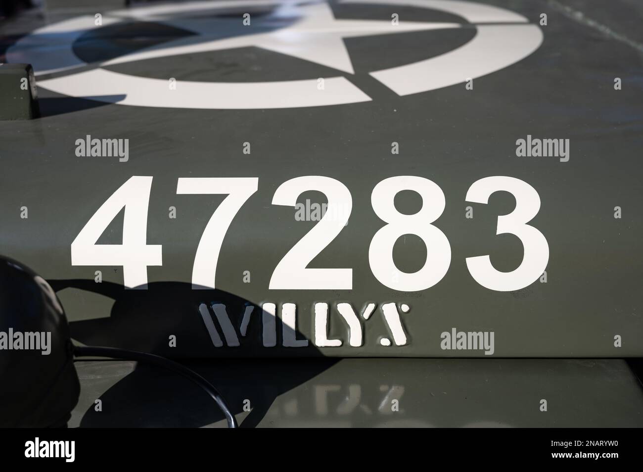 The Detail of an old green Jeep Willys military SUV. star and ...