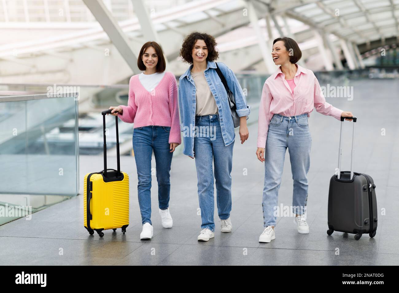 Travelling Together. Group Of Cheerful Female Friends Walking With ...