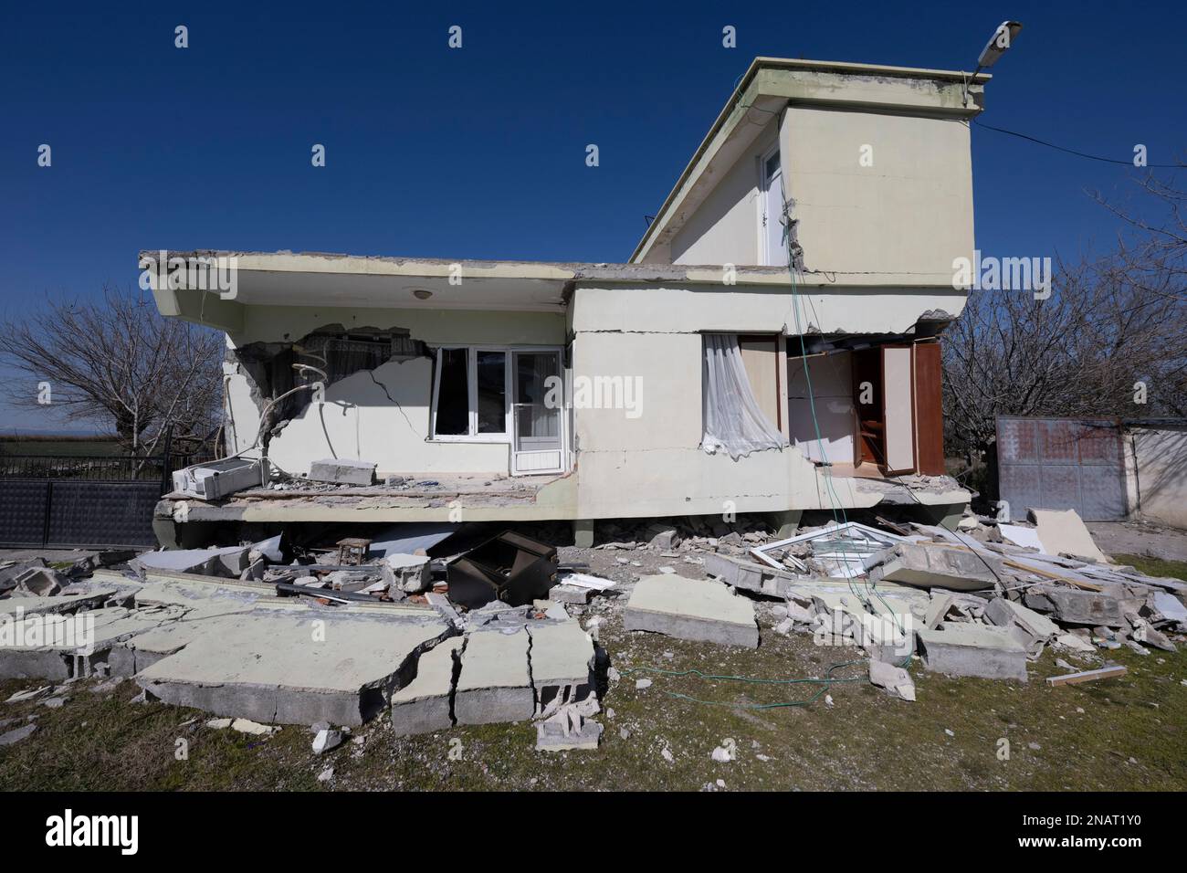 13 February 2023, Turkey, Ördekdede: Completely destroyed is this house ...