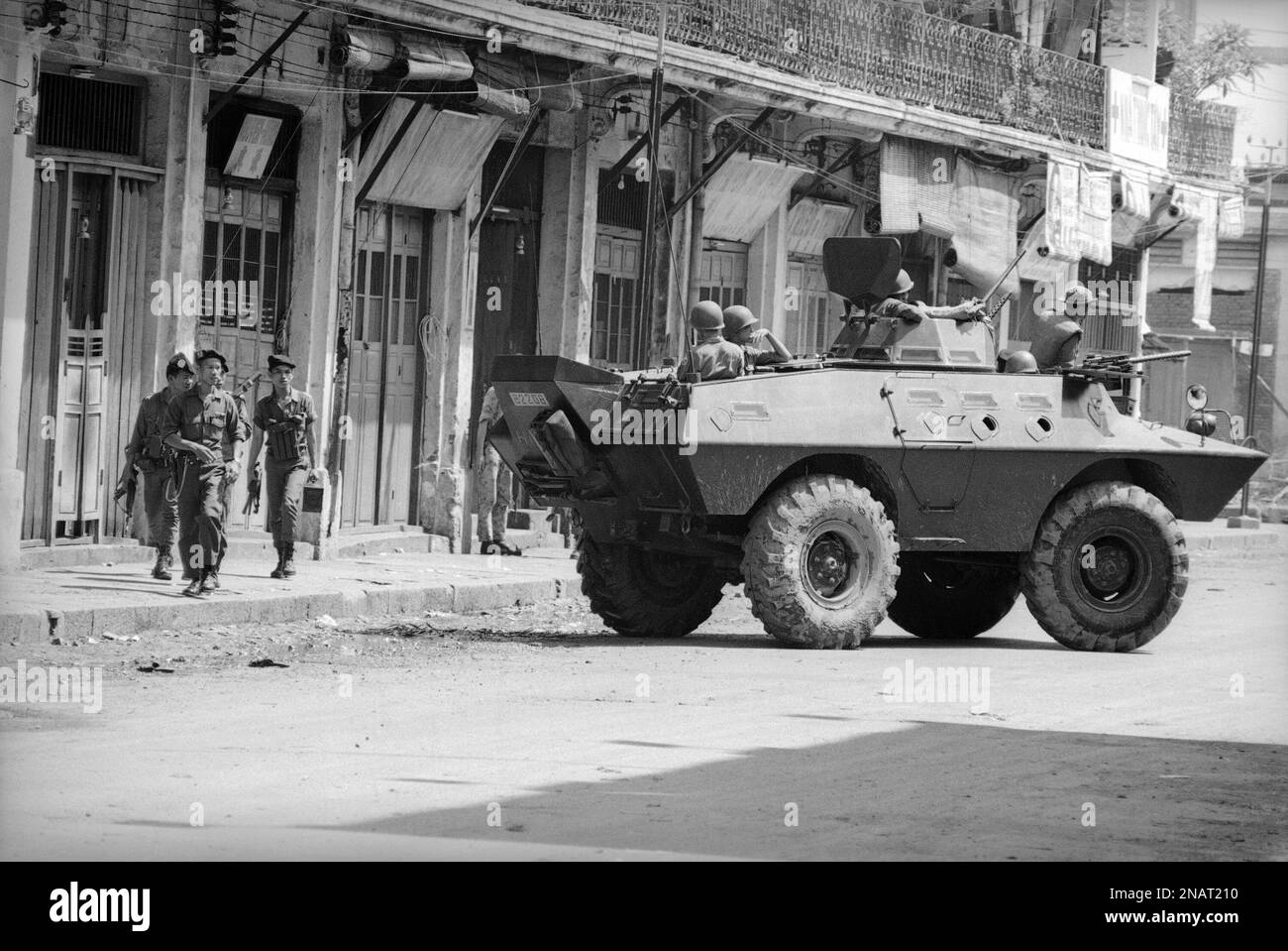 A group of Vietnamese Rangers, most of them decorated with bandoleers ...