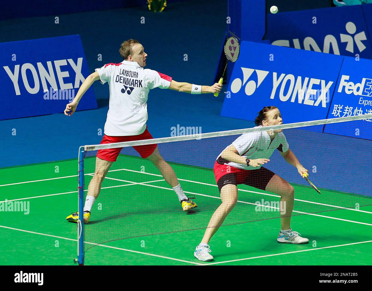 Denmark’s Kamilla Rytter Juhl, right and Thomas Laybourn, left, play ...