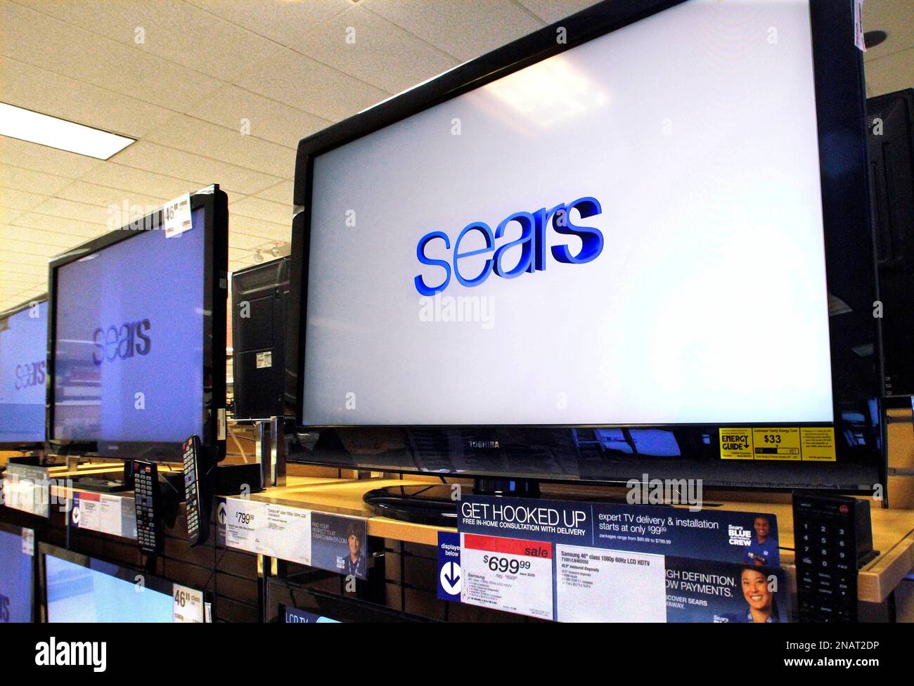In this Nov. 15, 2011, the Sears logo is seen on a television for sale ...