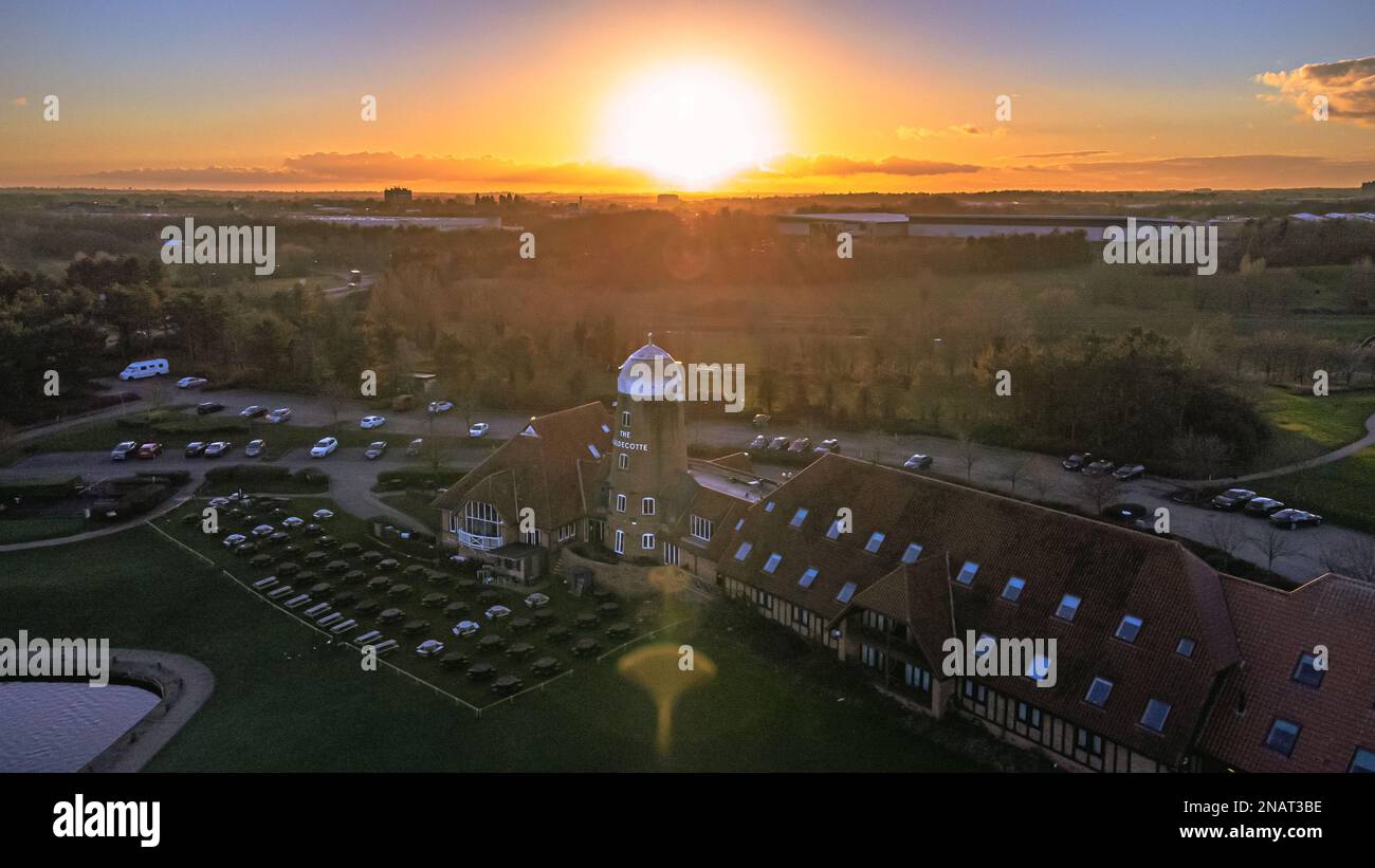 An aerial view of The Caldecotte - Pub & Grill building at sunset Stock ...