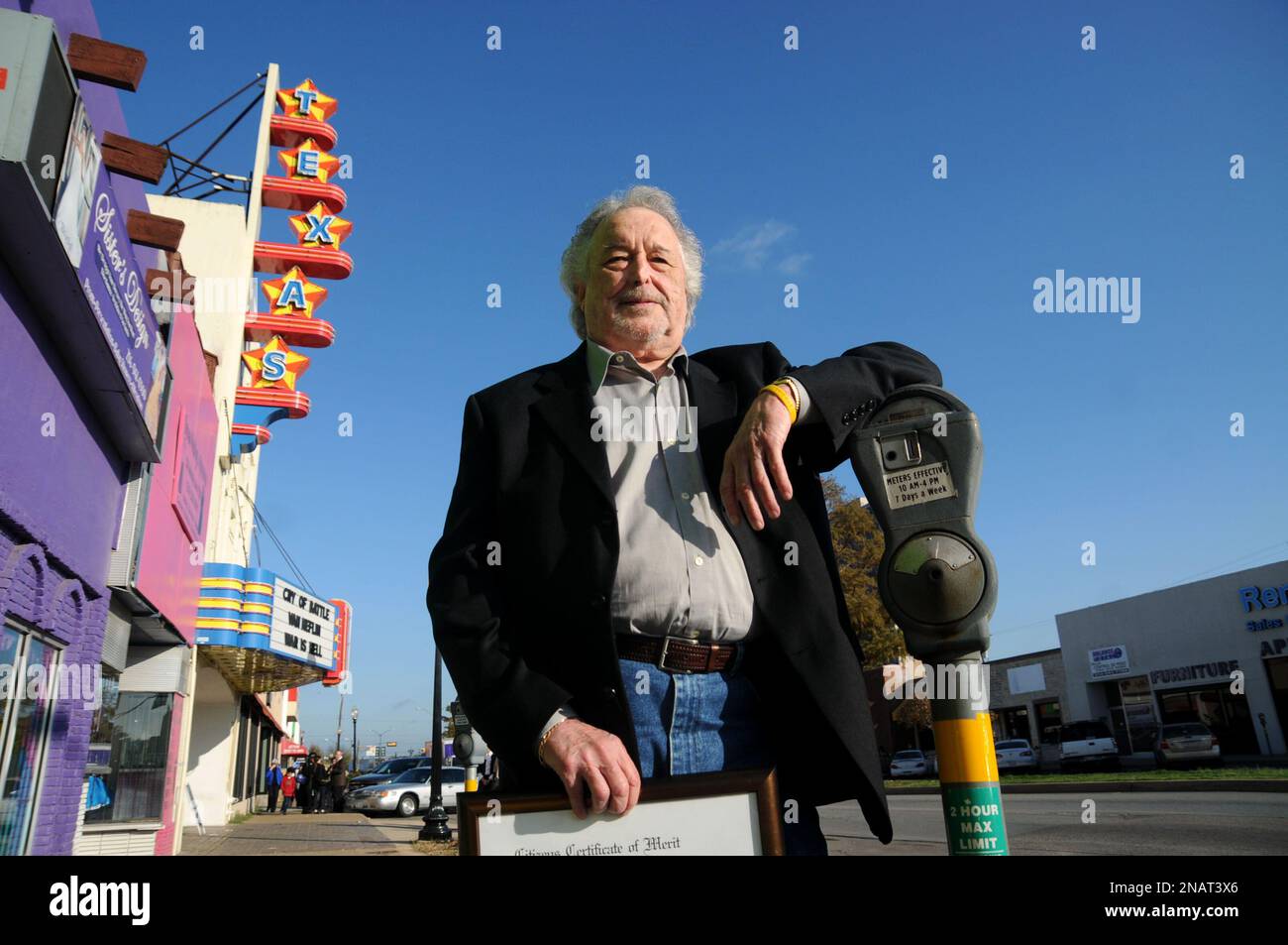 Johnny Calvin Brewer stands in front of the Texas Theatre, Tuesday, Nov ...