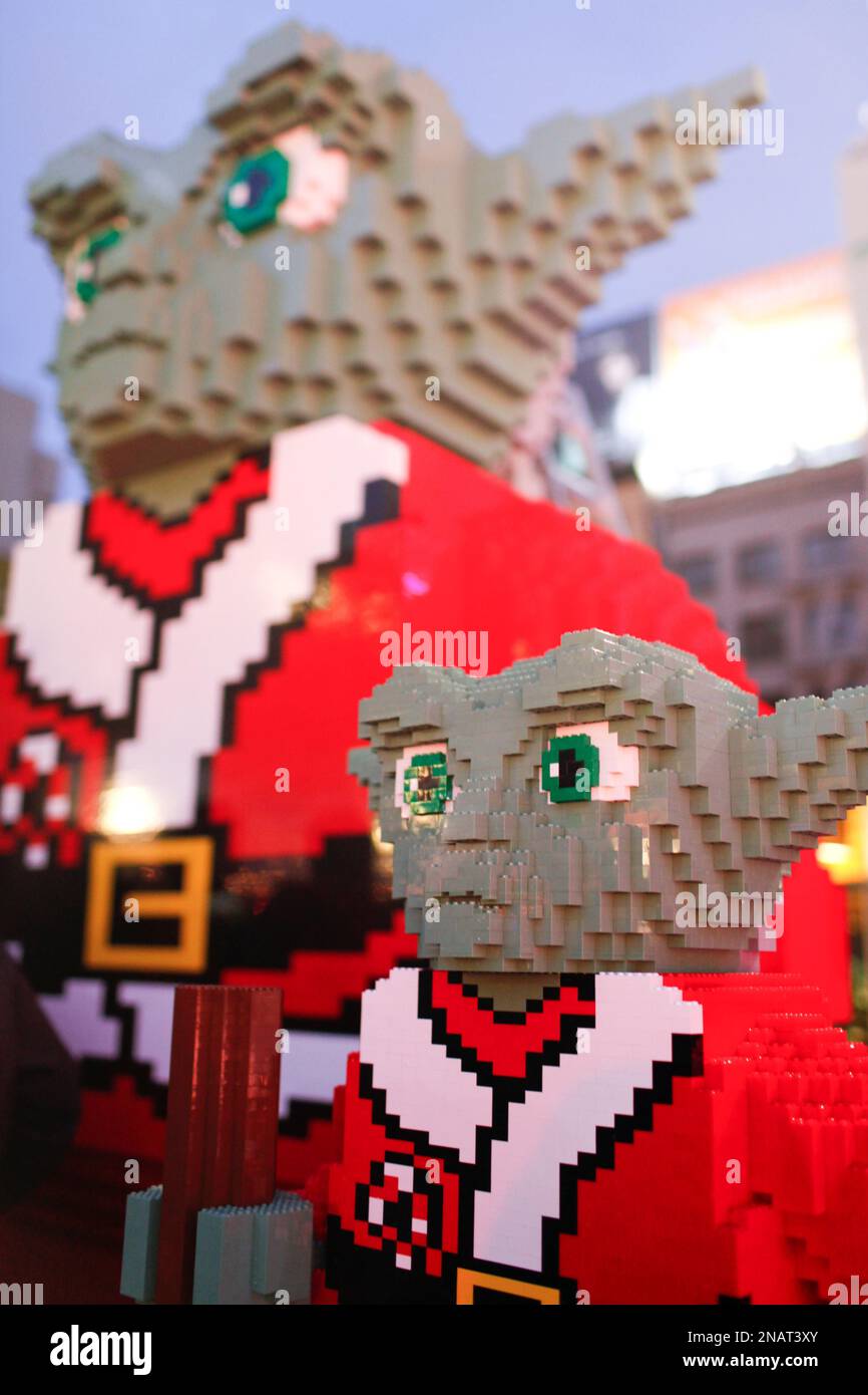 The 12-foot and 3-foot LEGO® Santa Yoda models, constructed over three ...