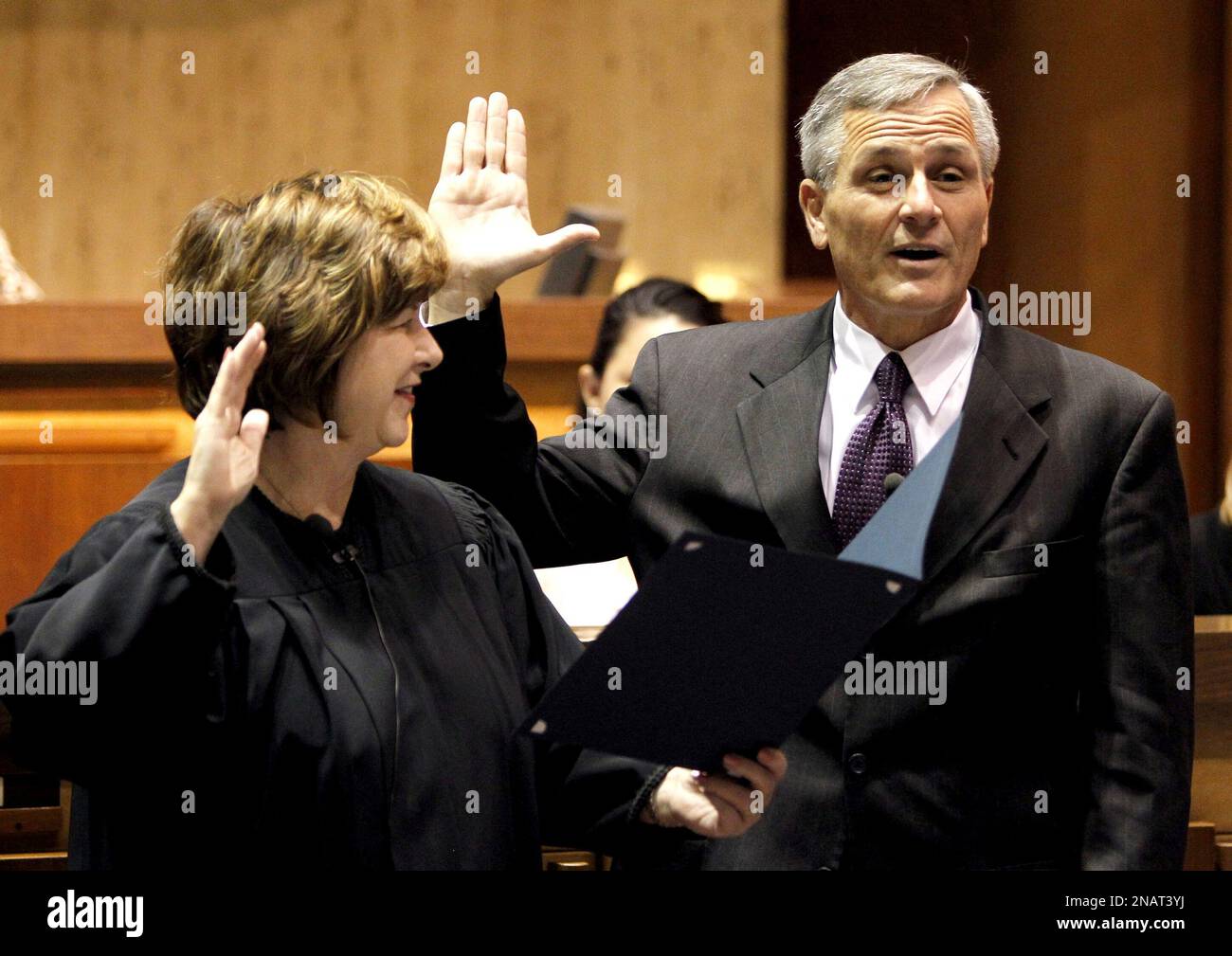 Sen. Jerry Lewis, R-Mesa, right, takes the oath of office on the ...