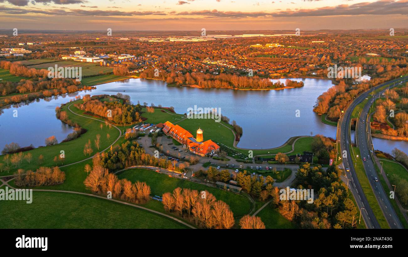 An aerial view of Caldecotte lake and its surroundings on a beautiful ...