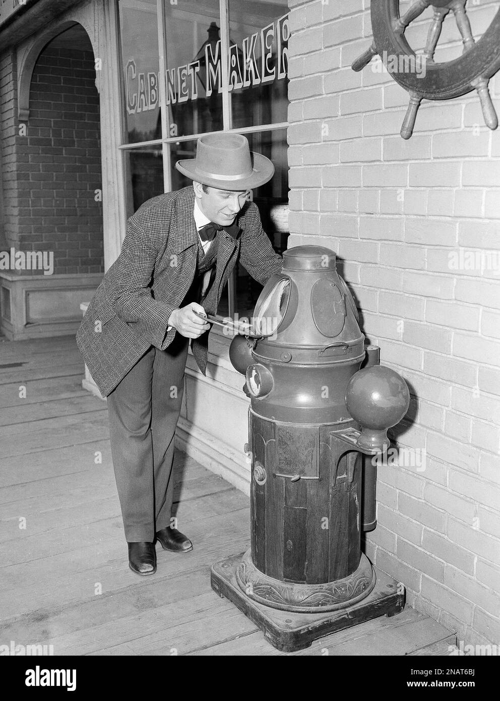 Actor Bill Shirley looks over a binnacle, one of the old Mississippi ...
