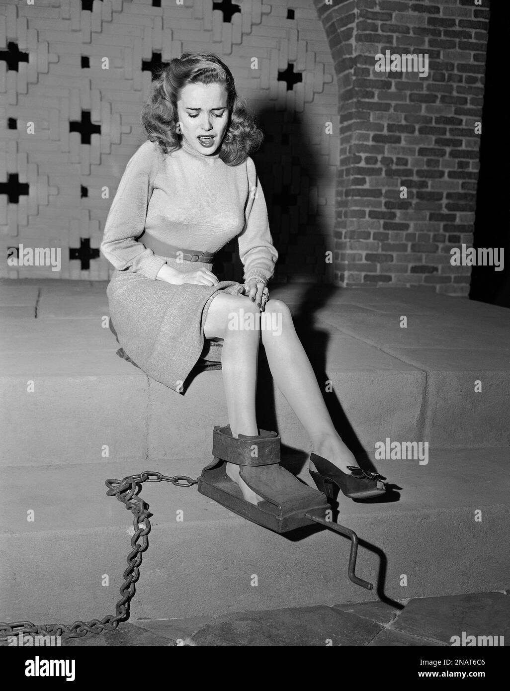 No, actress Lois Collier is not being measured for a new pair of shoes. She’s demonstrating a ...