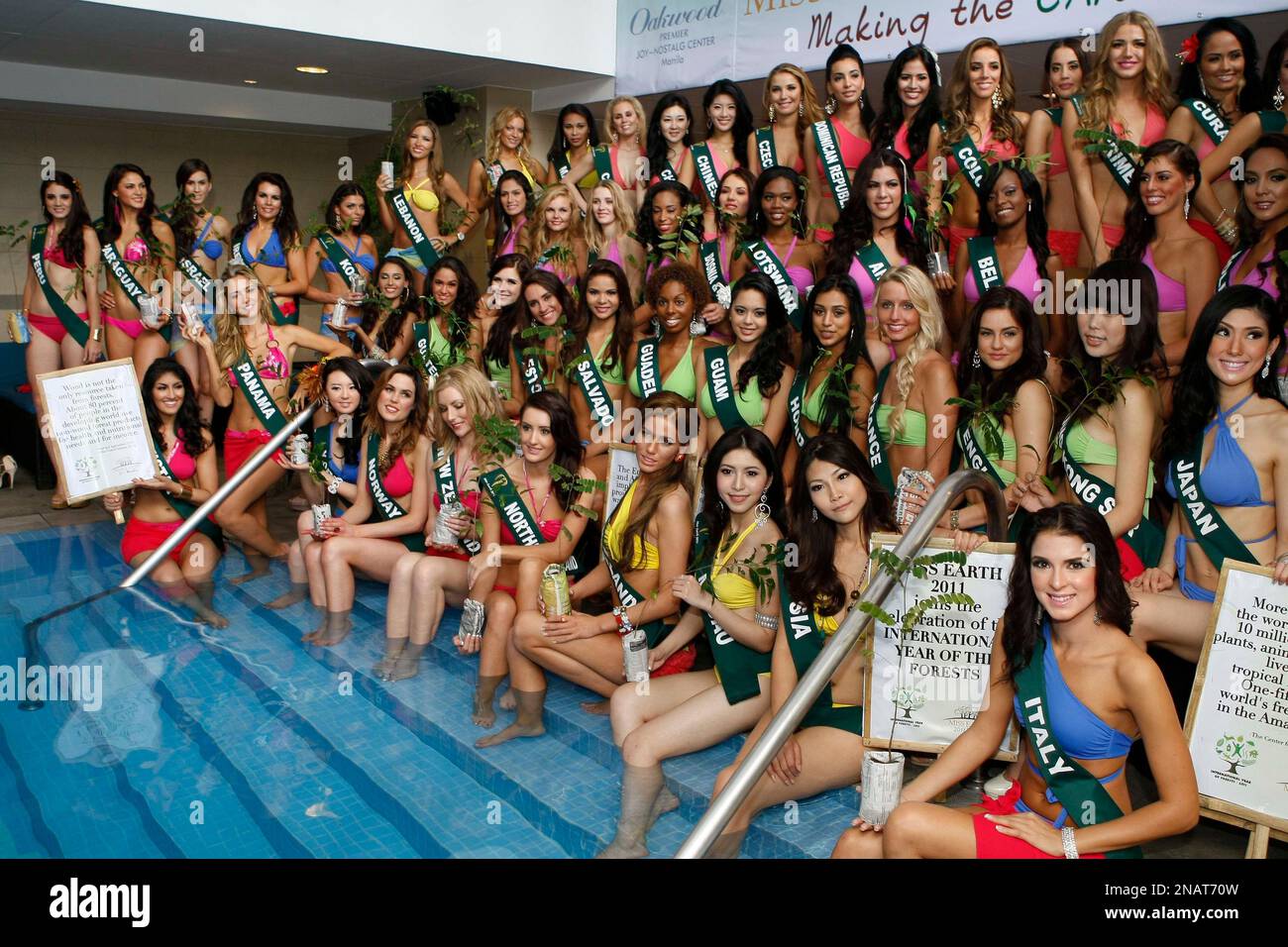 Candidates For The Miss Earth 2011 Beauty Contest Pose By The Poolside