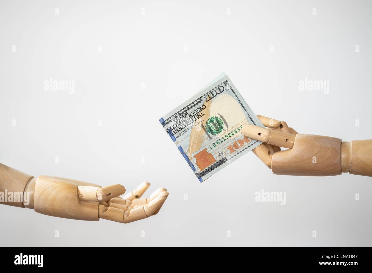 Money Financial and Payment Concept. Closeup of wooden hand model ...