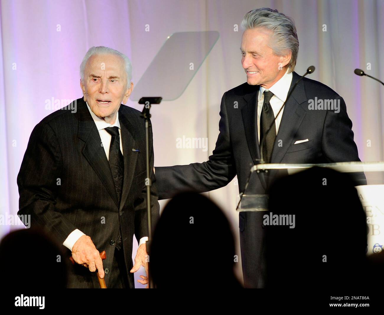 Actor Michael Douglas, right, introduces his father, honoree Kirk ...