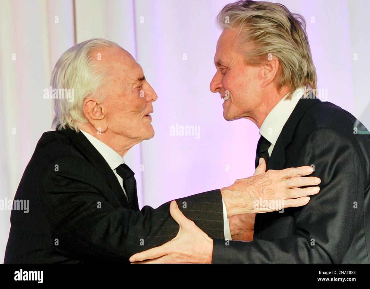 Actor Michael Douglas, right, introduces his father, honoree Kirk ...