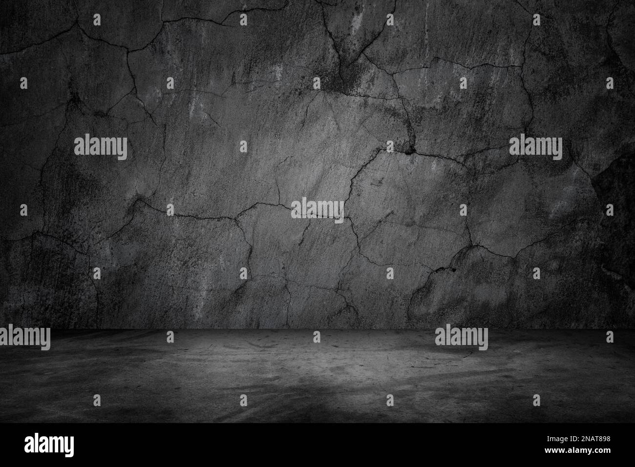 Dark room with black cracked wall , concrete floor textured background ...