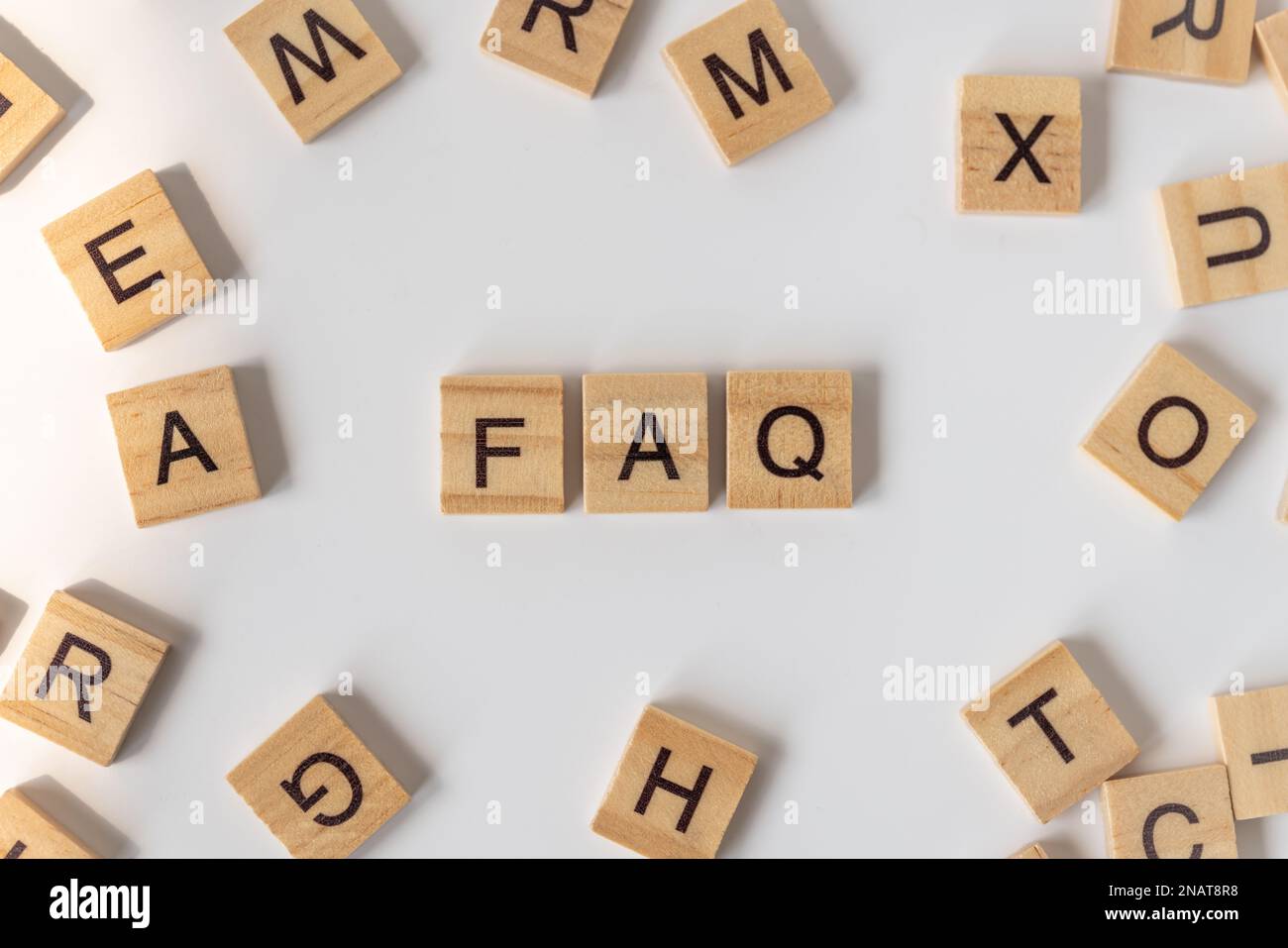 Frequently asked questions Concept. Wooden letter block wording FAQ ...