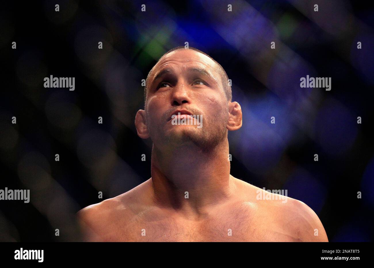 Dan Henderson, center, is shown before a UFC 139 Mixed Martial Arts ...