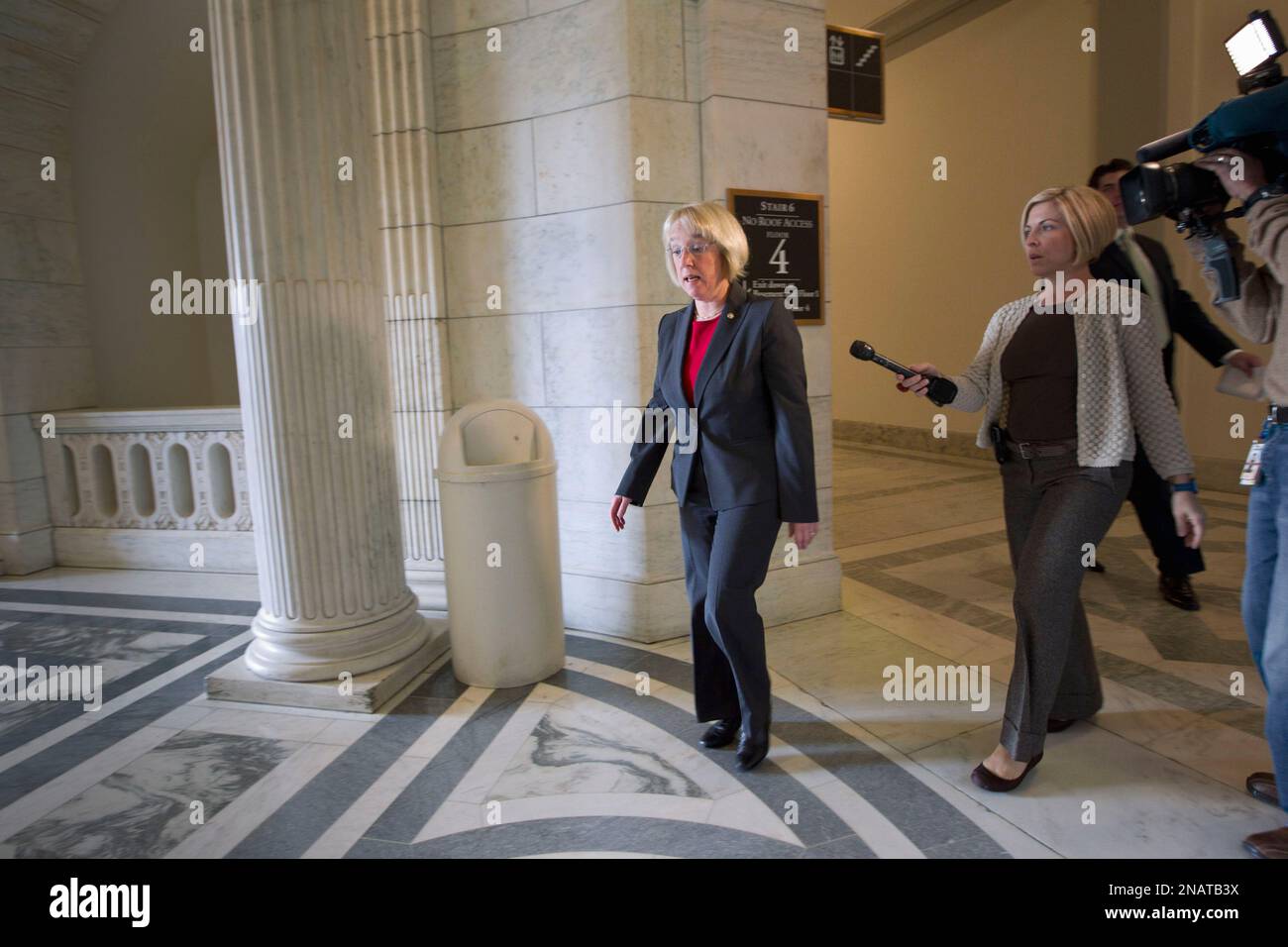 Supercommittee Co-Chair Sen. Patty Murray, D-Wash. is pursued by ...
