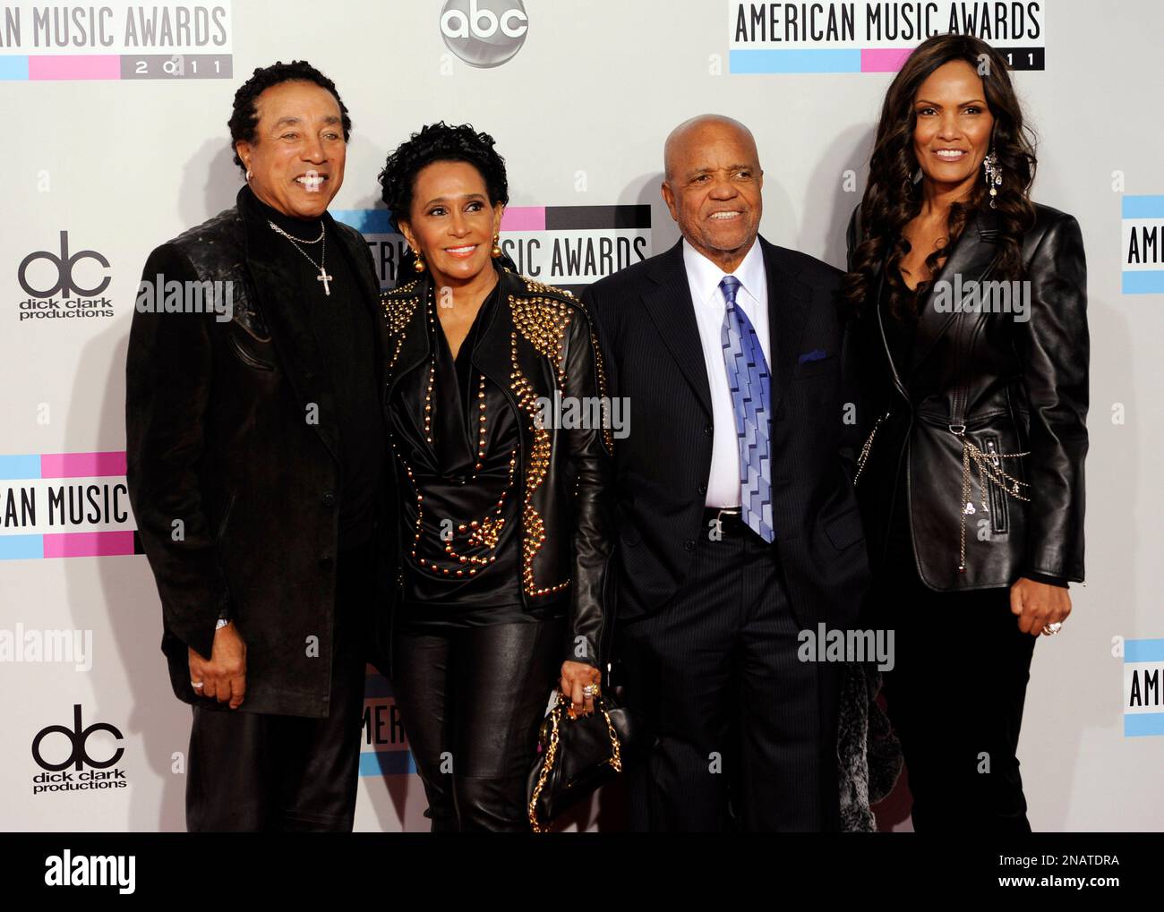 From left, Smokey Robinson, wife Frances Gladney, and Berry Gordy ...
