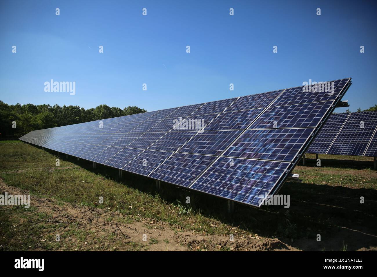 Renewable solar power plant with sunshine. Solar panel, photovoltaic ...