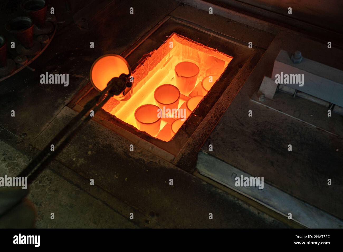 casting gold mining industry factory metal production Stock Photo - Alamy