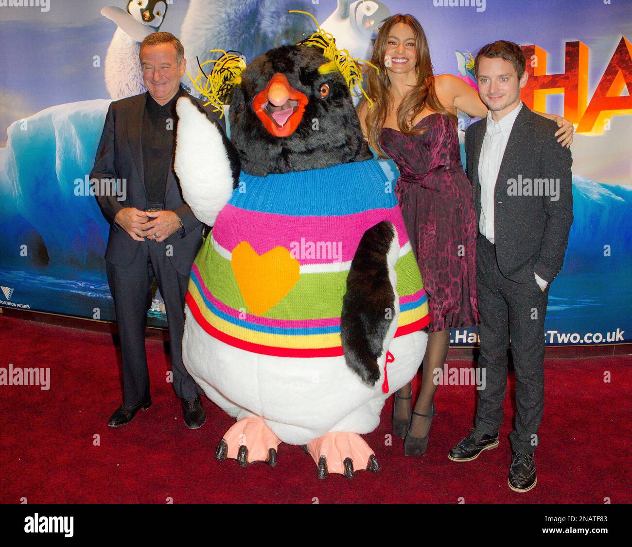 Actors, from left, Robin Williams, Sofia Vergara and Elijah Wood pose ...