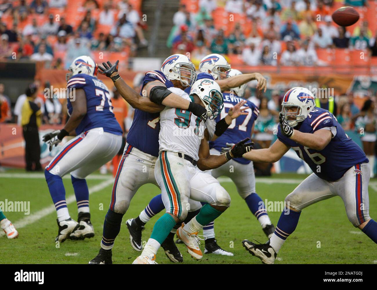 Miami Dolphins outside linebacker Cameron Wake (91) is held by Buffalo ...