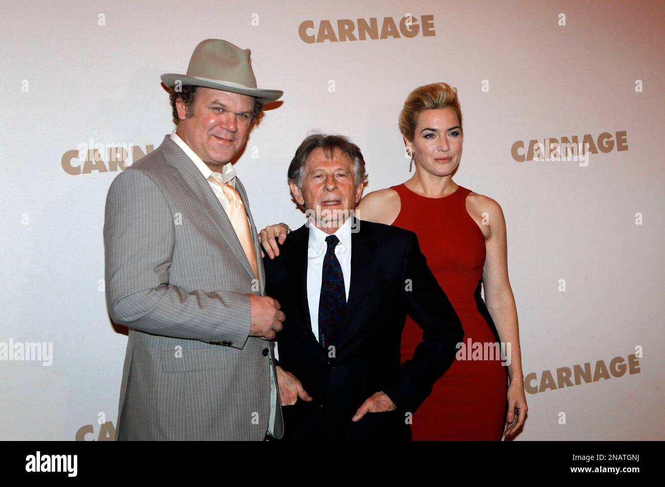 U.S. actor John C. Reilly, left, British actress Kate Winslet, right ...