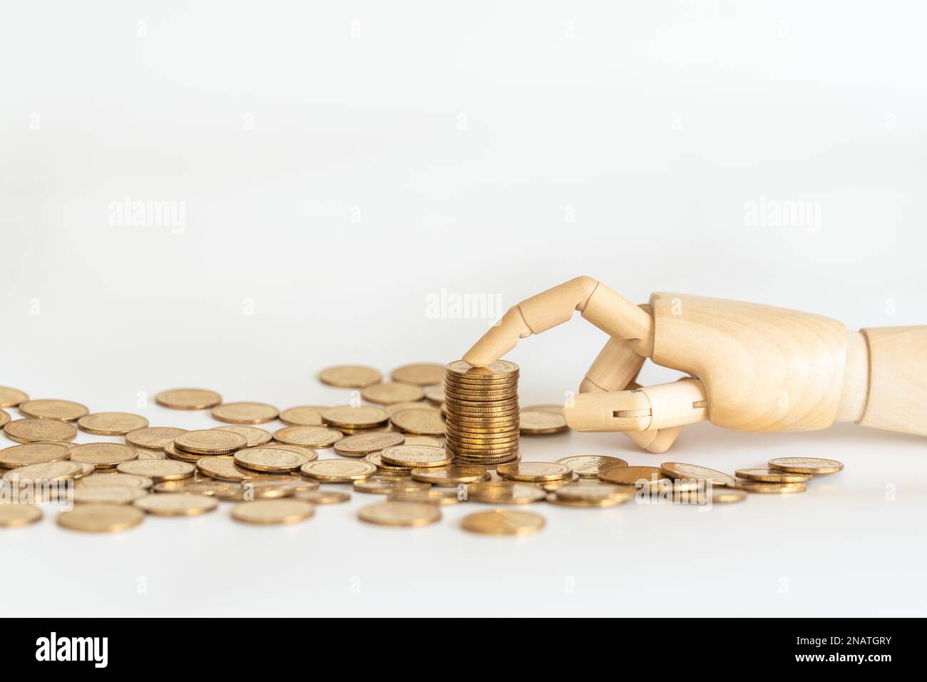 Business Money and Saving Concept. Closeup of wooden hand model finger ...